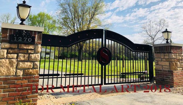 Driveway Gates Installed From Metal Posts Behind Columns | Custom ...